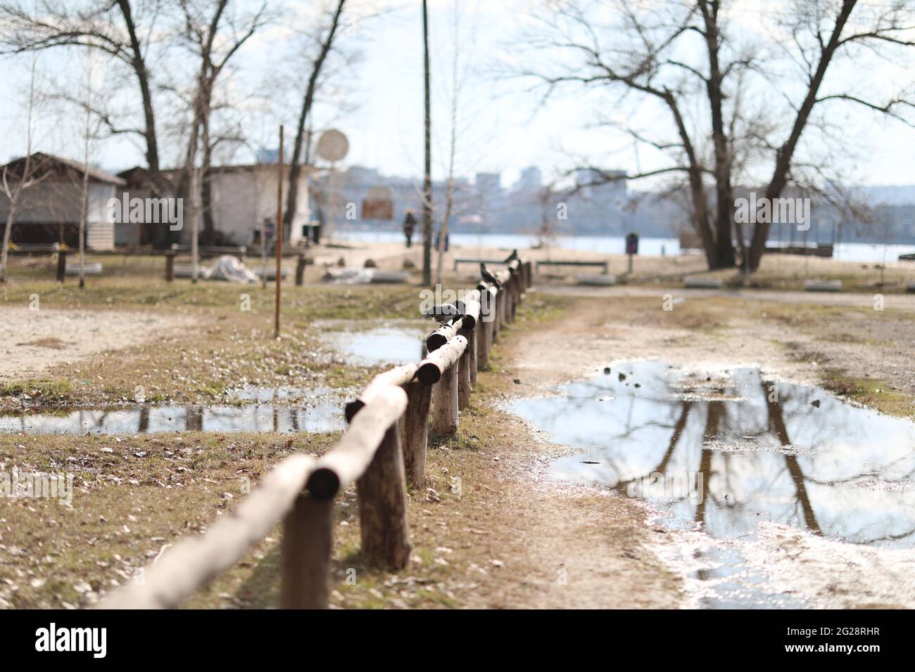 large puddles on the beach after rain in bad weather Stock Photo - Alamy