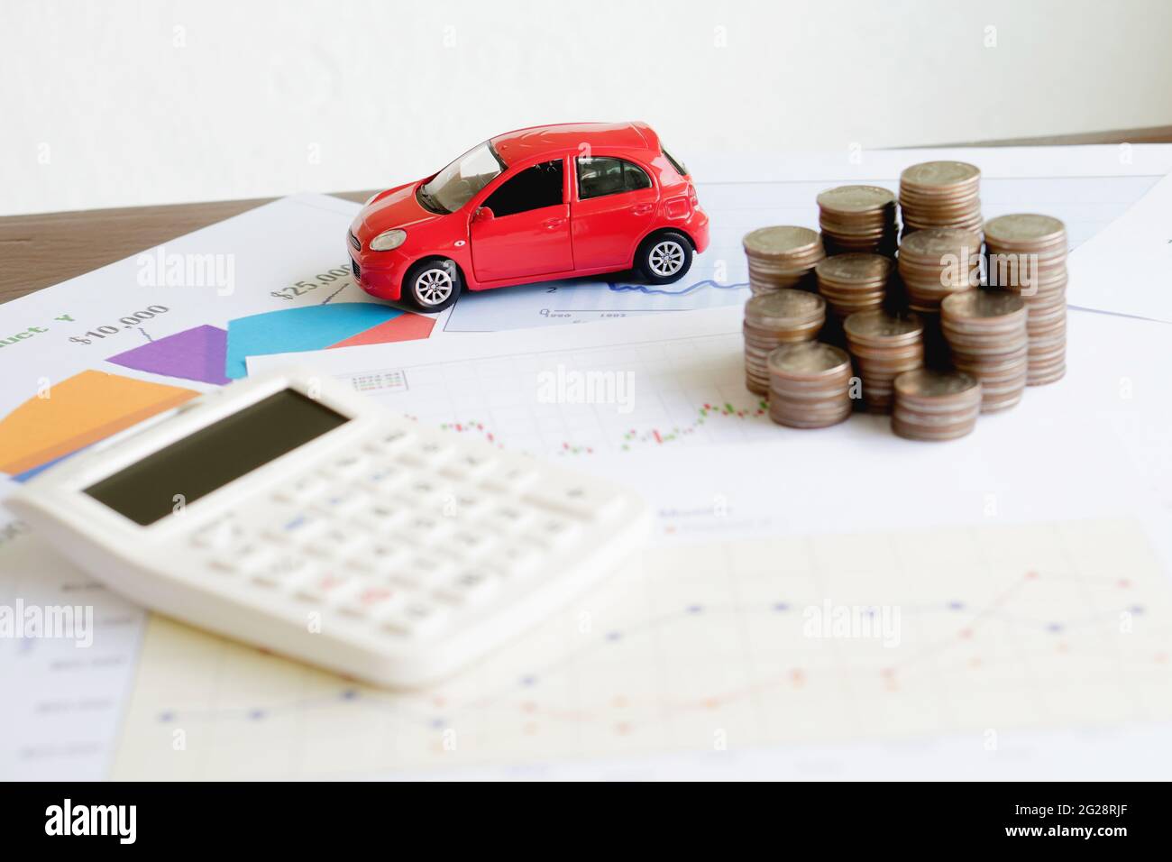 Car expenses calculate with notes and toy car Stock Photo - Alamy