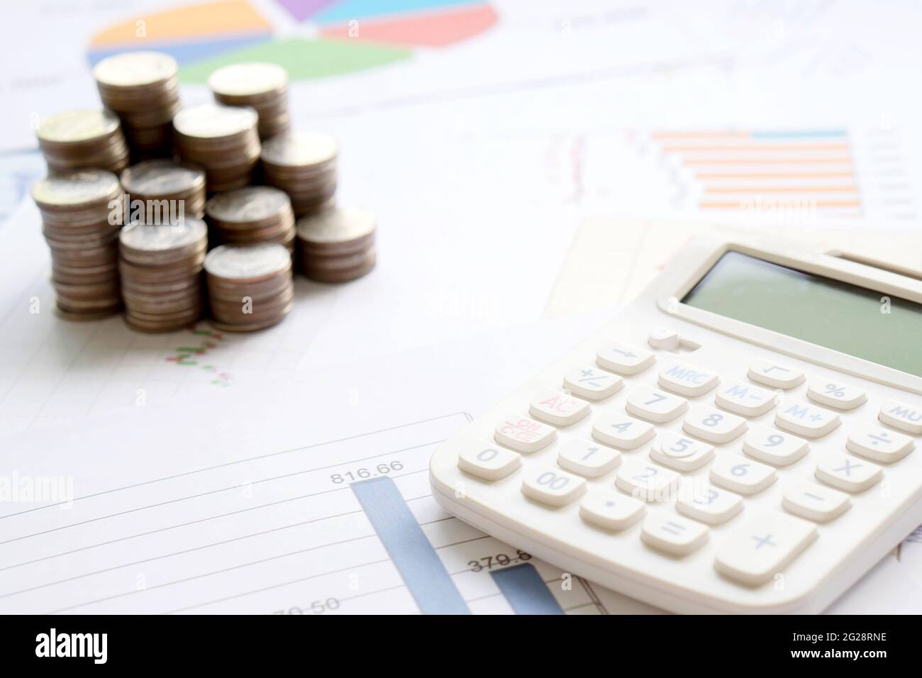 Coins, chart and calculator as a symbol for exchange rates Stock Photo ...
