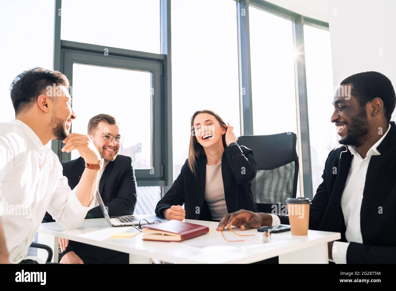 Office meeting of a group of young company workers Stock Photo - Alamy