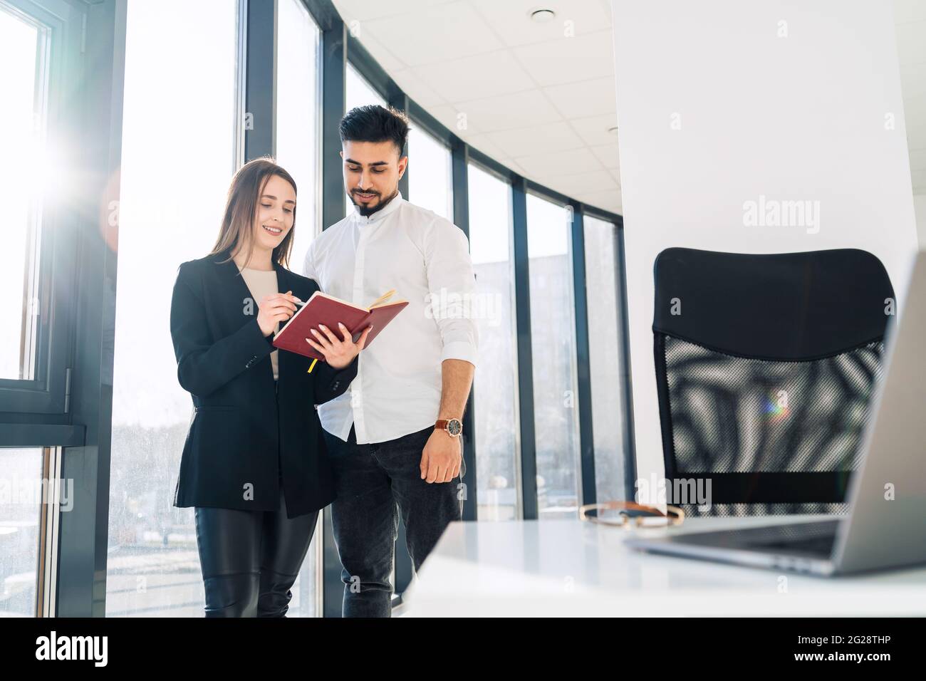 Male boss talking secretary hi-res stock photography and images - Alamy
