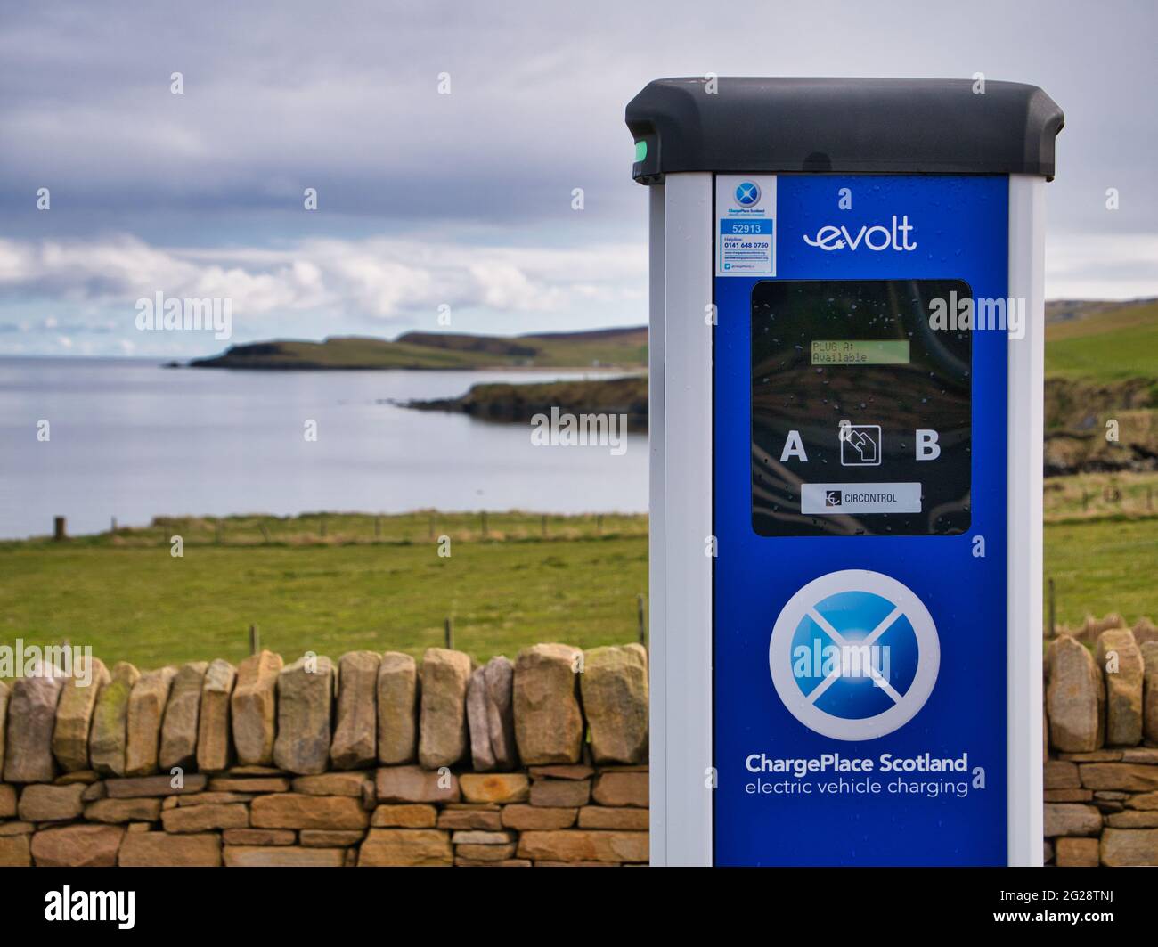 A two socket, blue, evolt ChargePlace Scotland in a remote, coastal ...