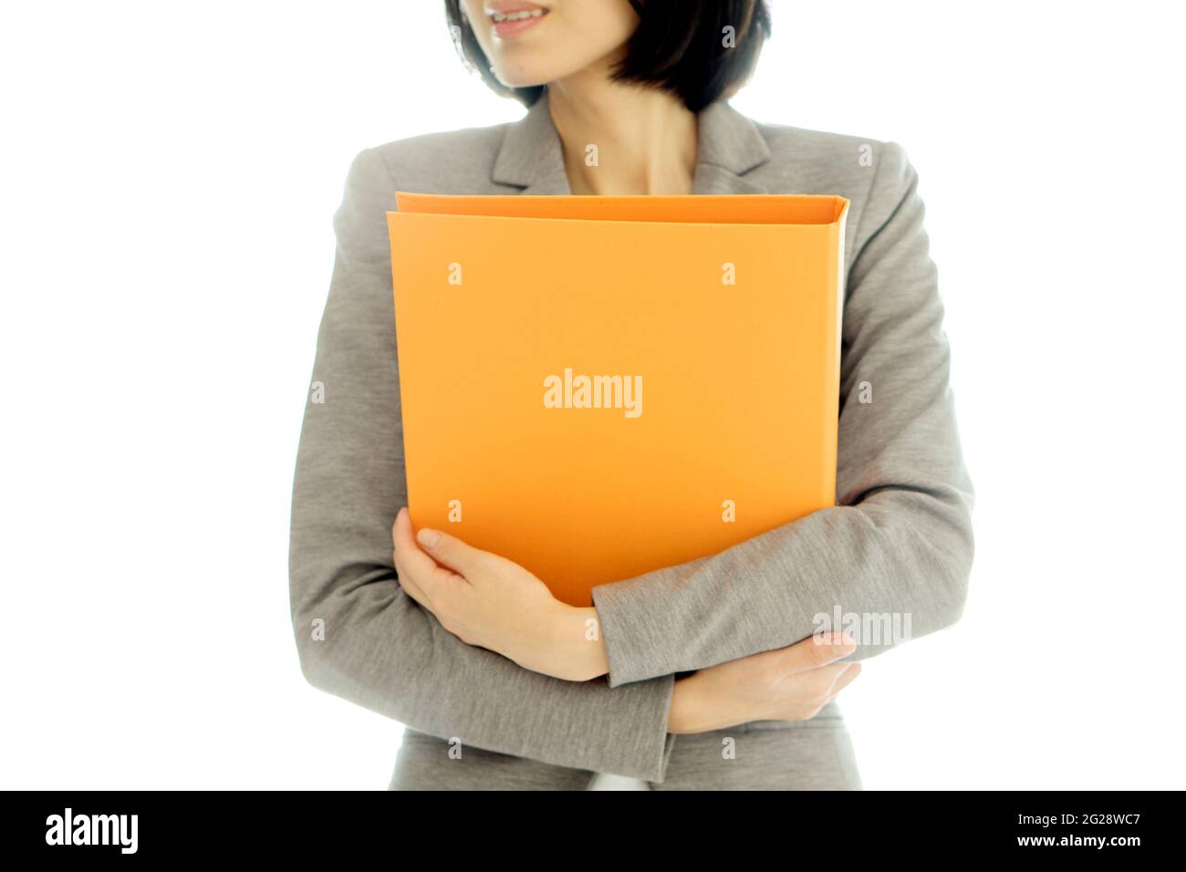 Business woman holding folder, isolated on white Stock Photo - Alamy