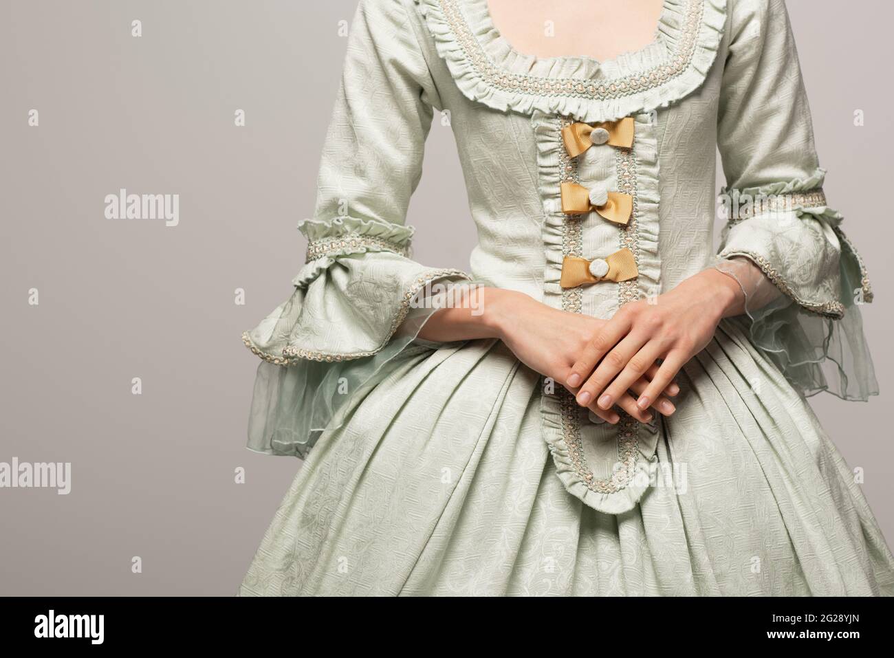 partial view of woman in elegant vintage dress isolated on grey Stock ...