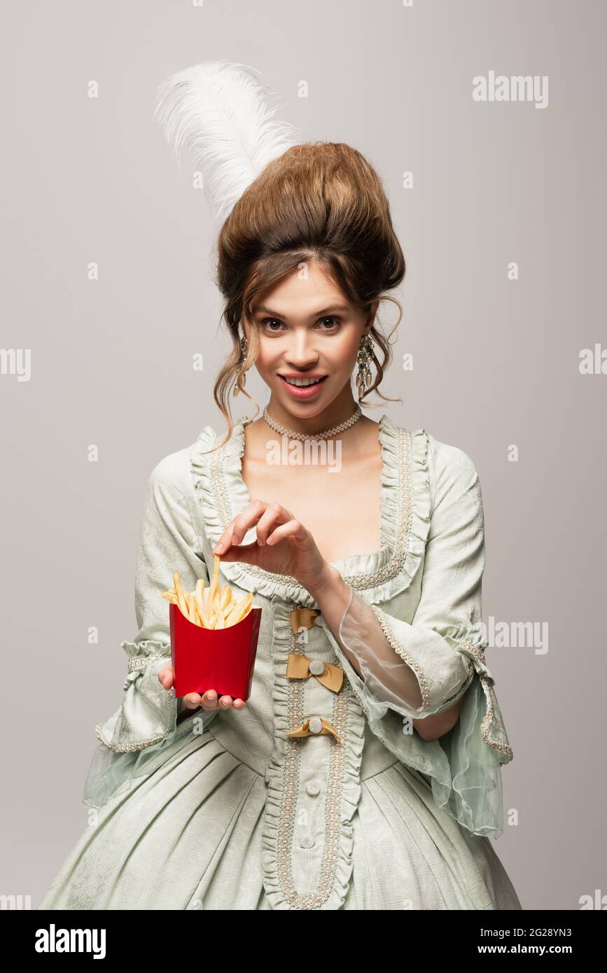 Holding french fries hi-res stock photography and images - Alamy