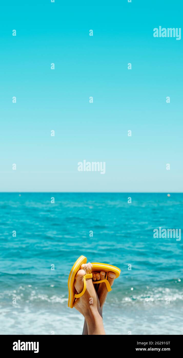Feet in flip flops hi-res stock photography and images - Alamy