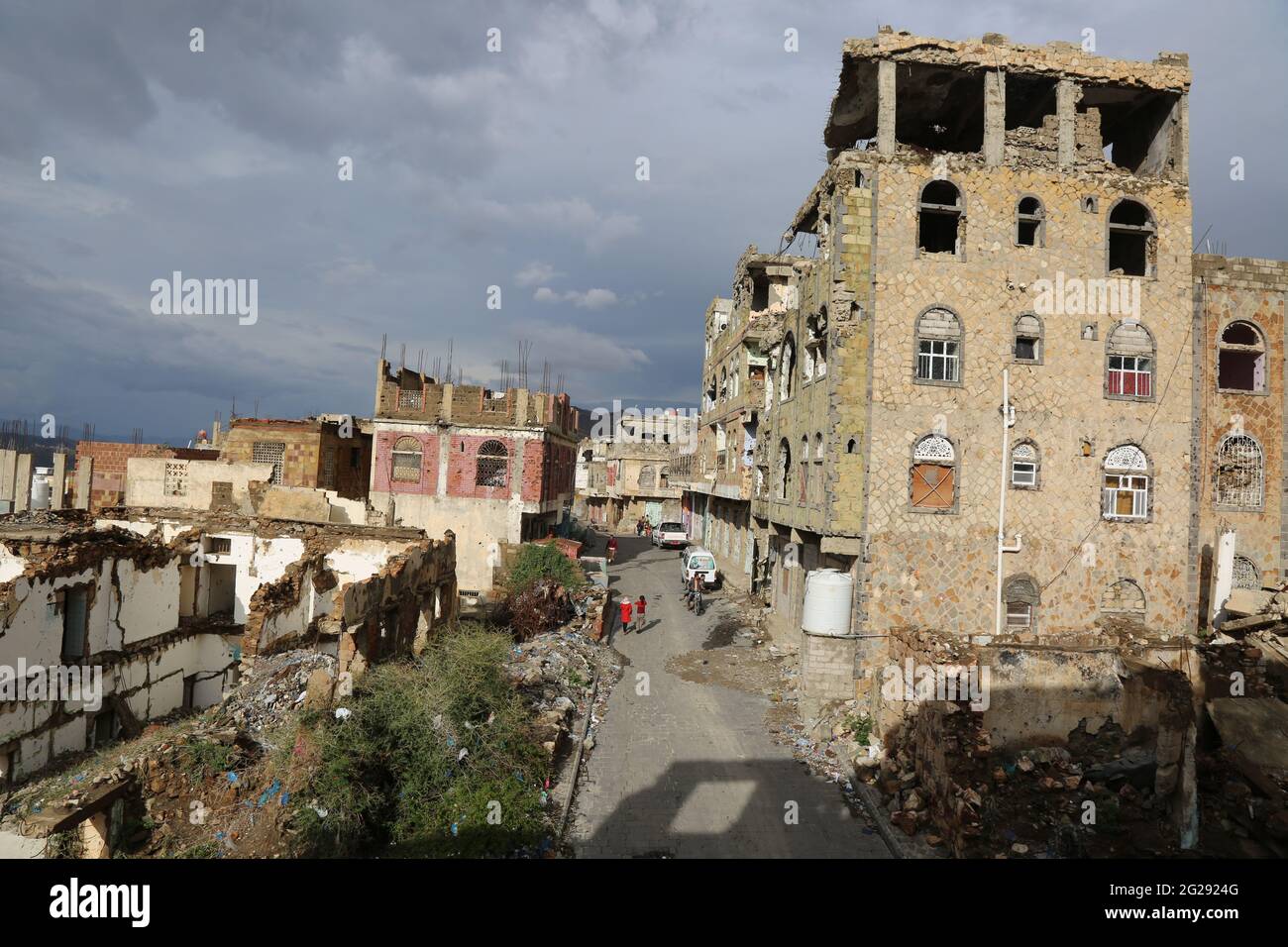 Taiz Yemen 29 Apr 2021 : Yemenis walking on the rubble of houses ...