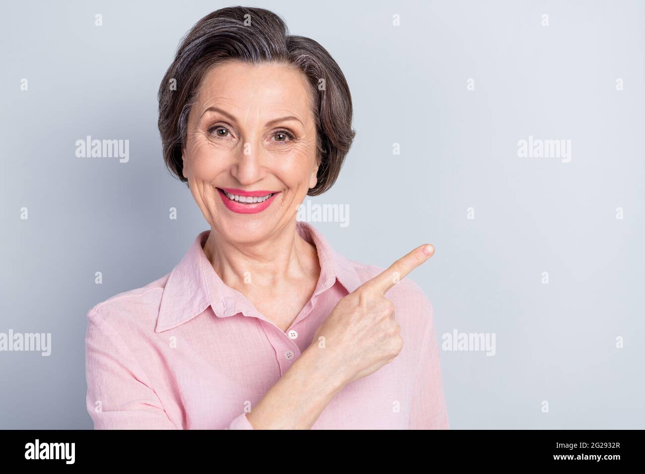 Old age woman pointing finger hi-res stock photography and images - Alamy