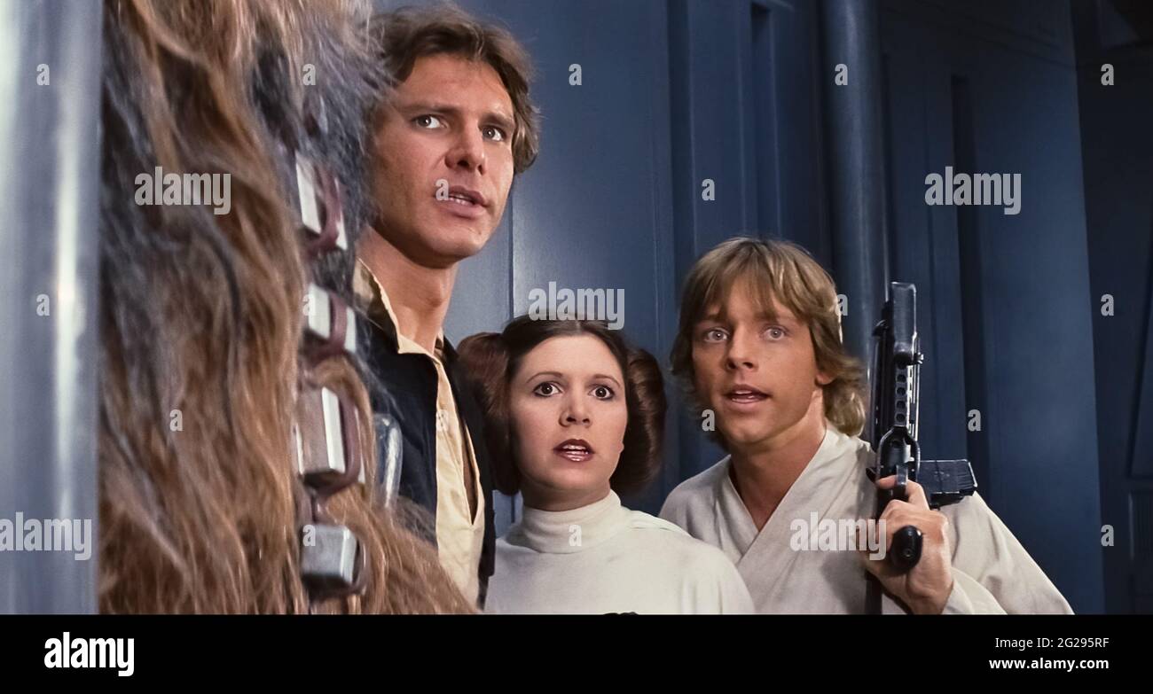USA. Carrie Fisher , Harrison Ford and Mark Hamill in a scene from the ...