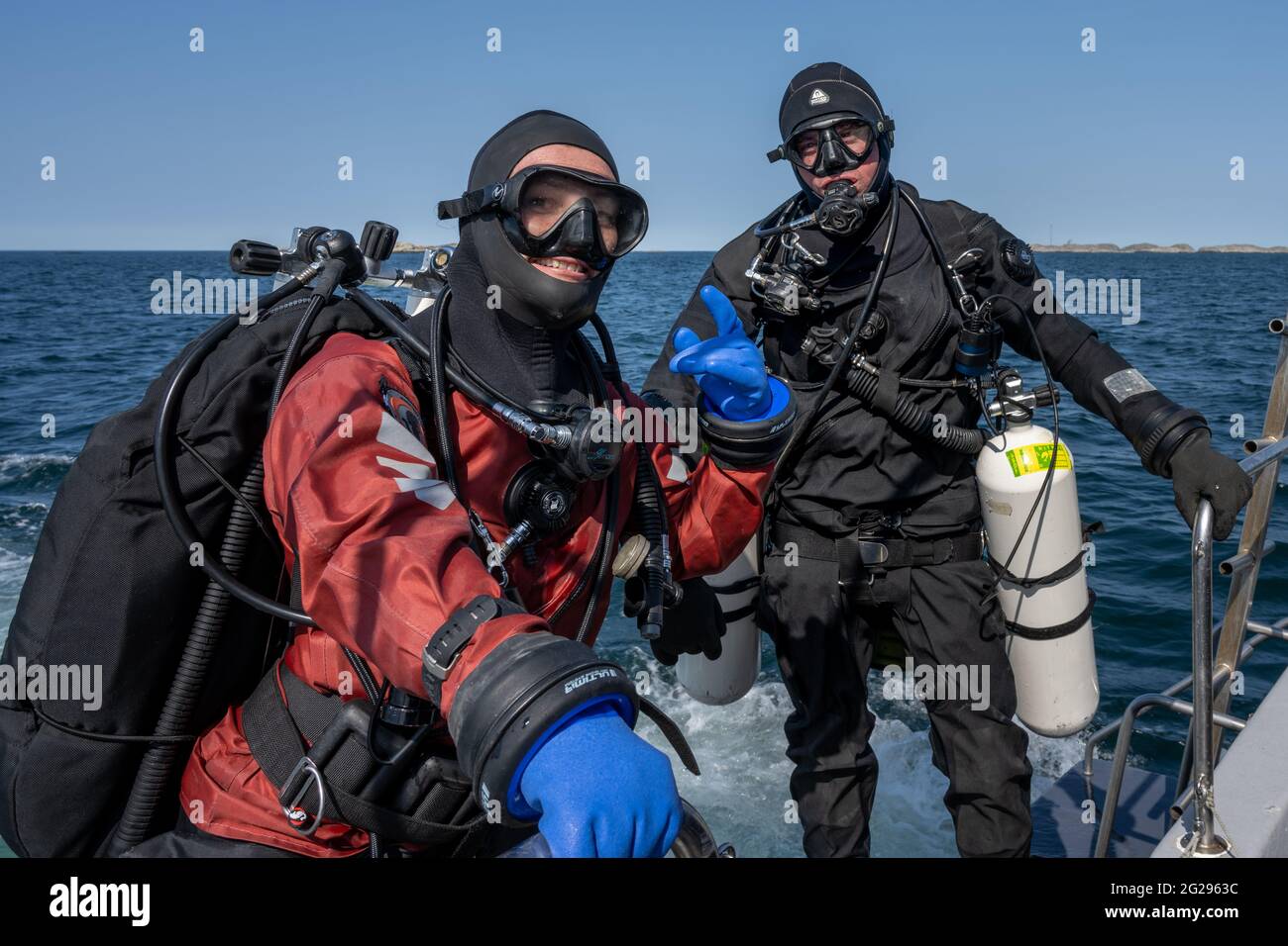 April 17, 2021 - Hamburgsund, Sweden: Two scuba divers ready to enter ...