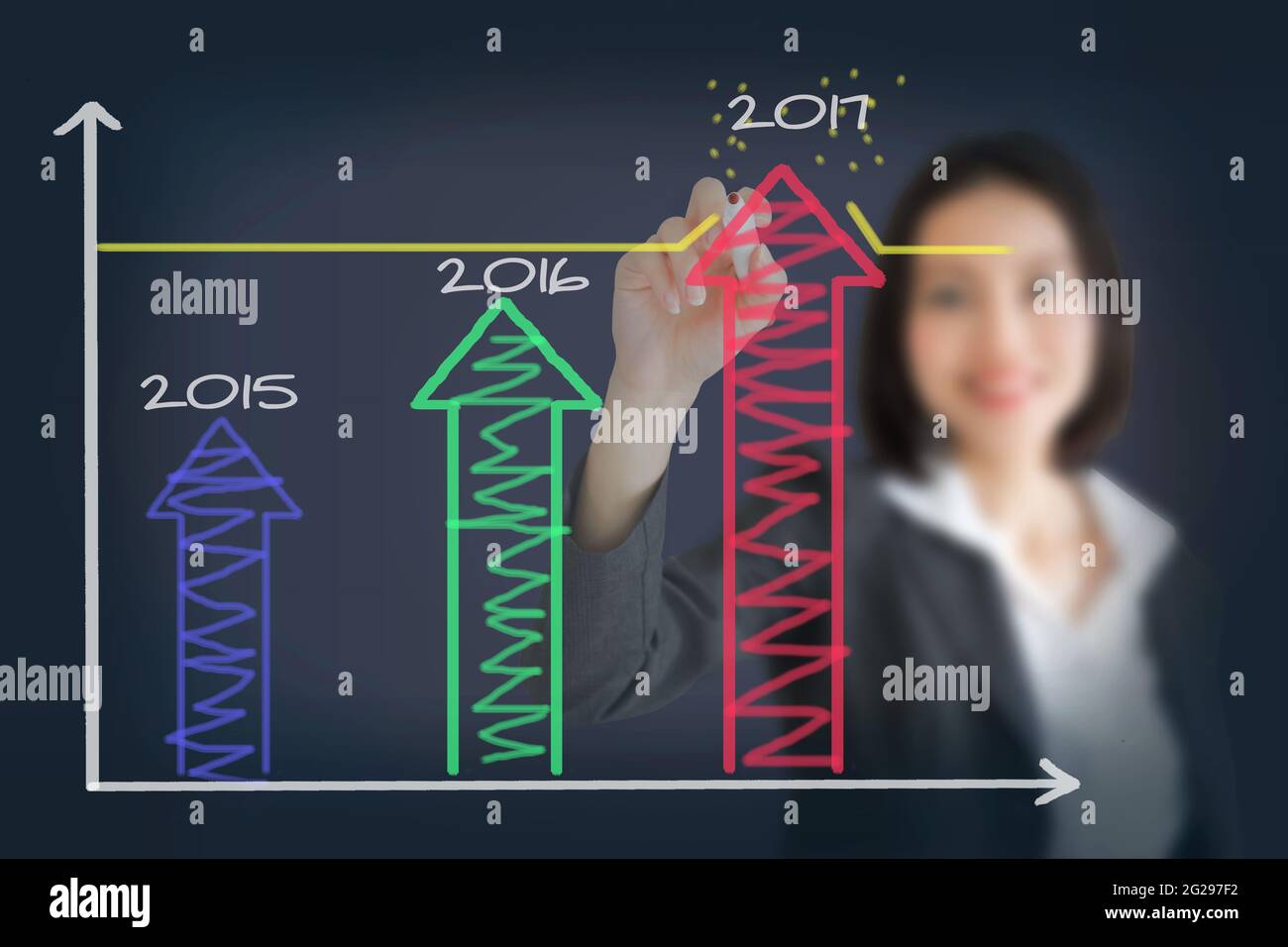 business woman drawing over target achievement graph Stock Photo - Alamy