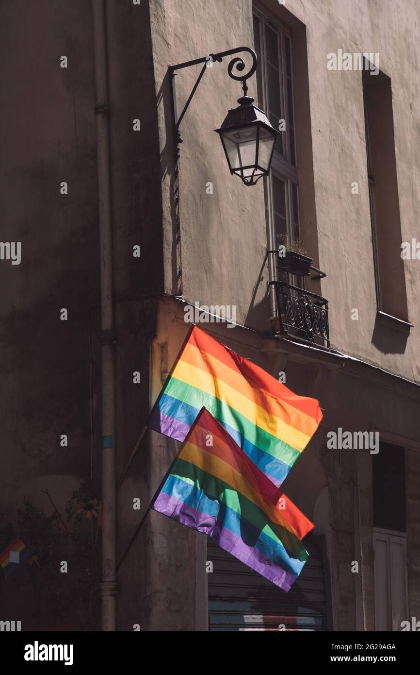 Transgender Pride flags. Lgbtq flags hanging at historic building ...