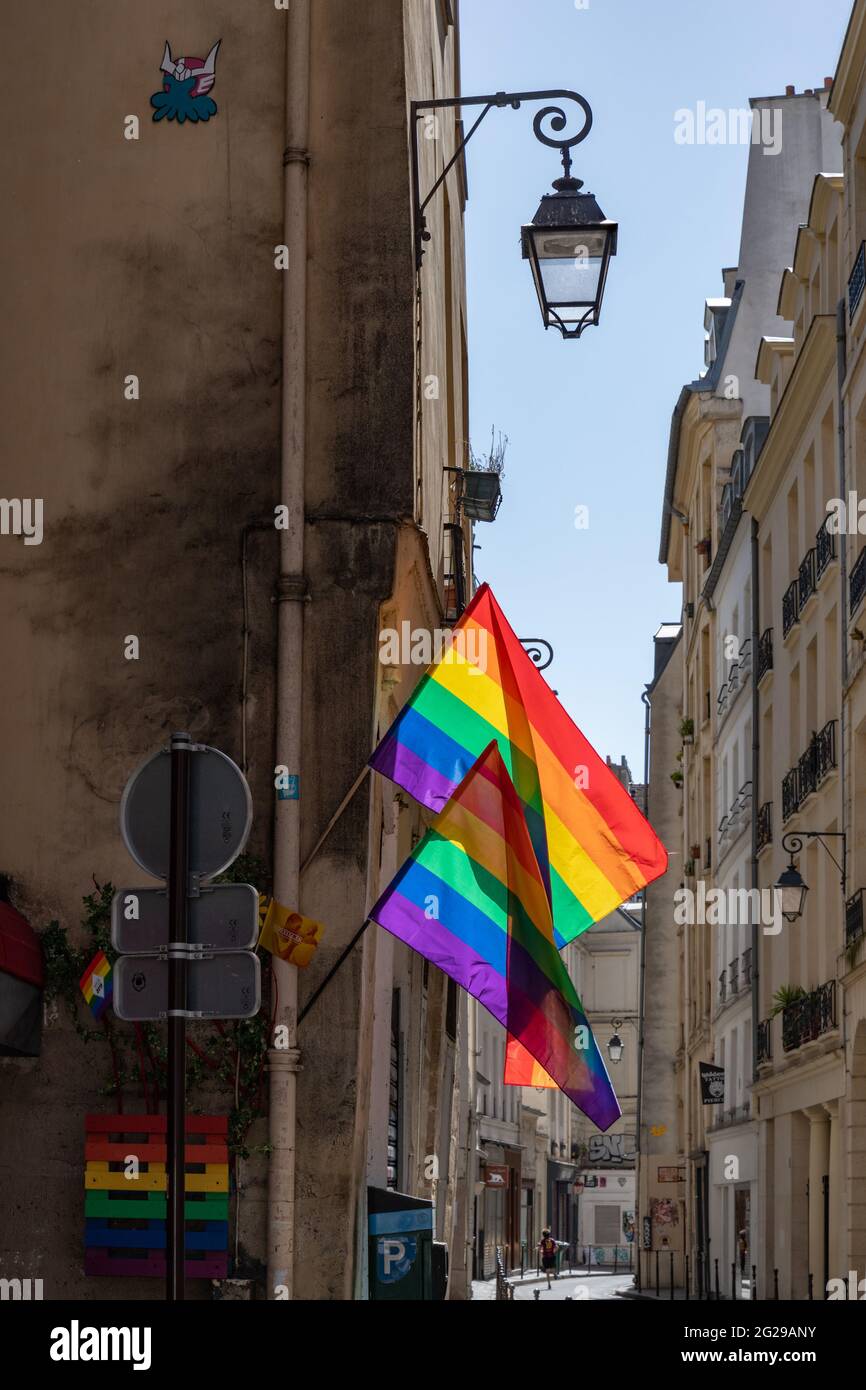 Lgbtq flags hanging at historic building corner during Paris pride ...