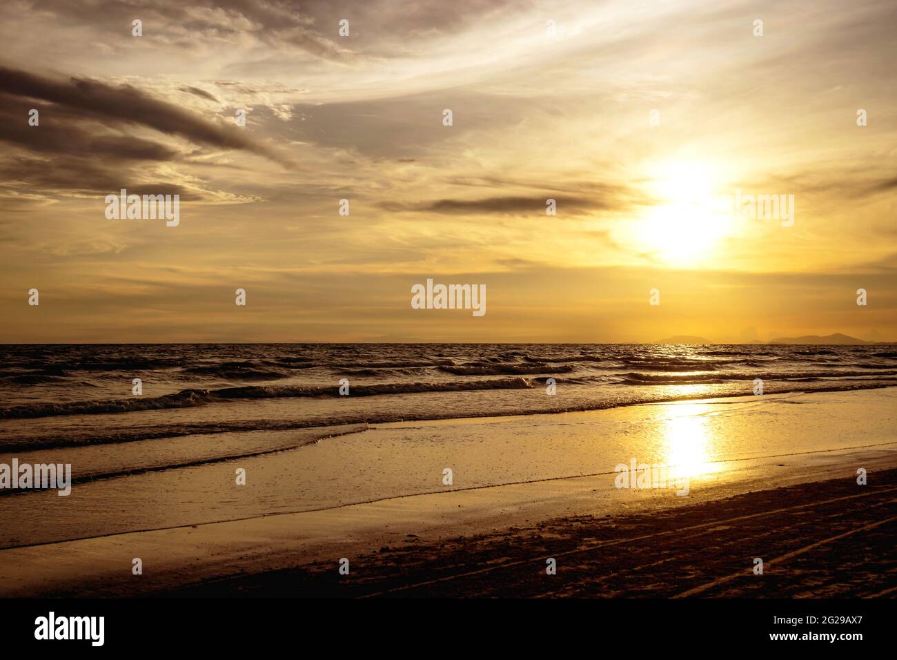 Sunrise over ocean Stock Photo - Alamy