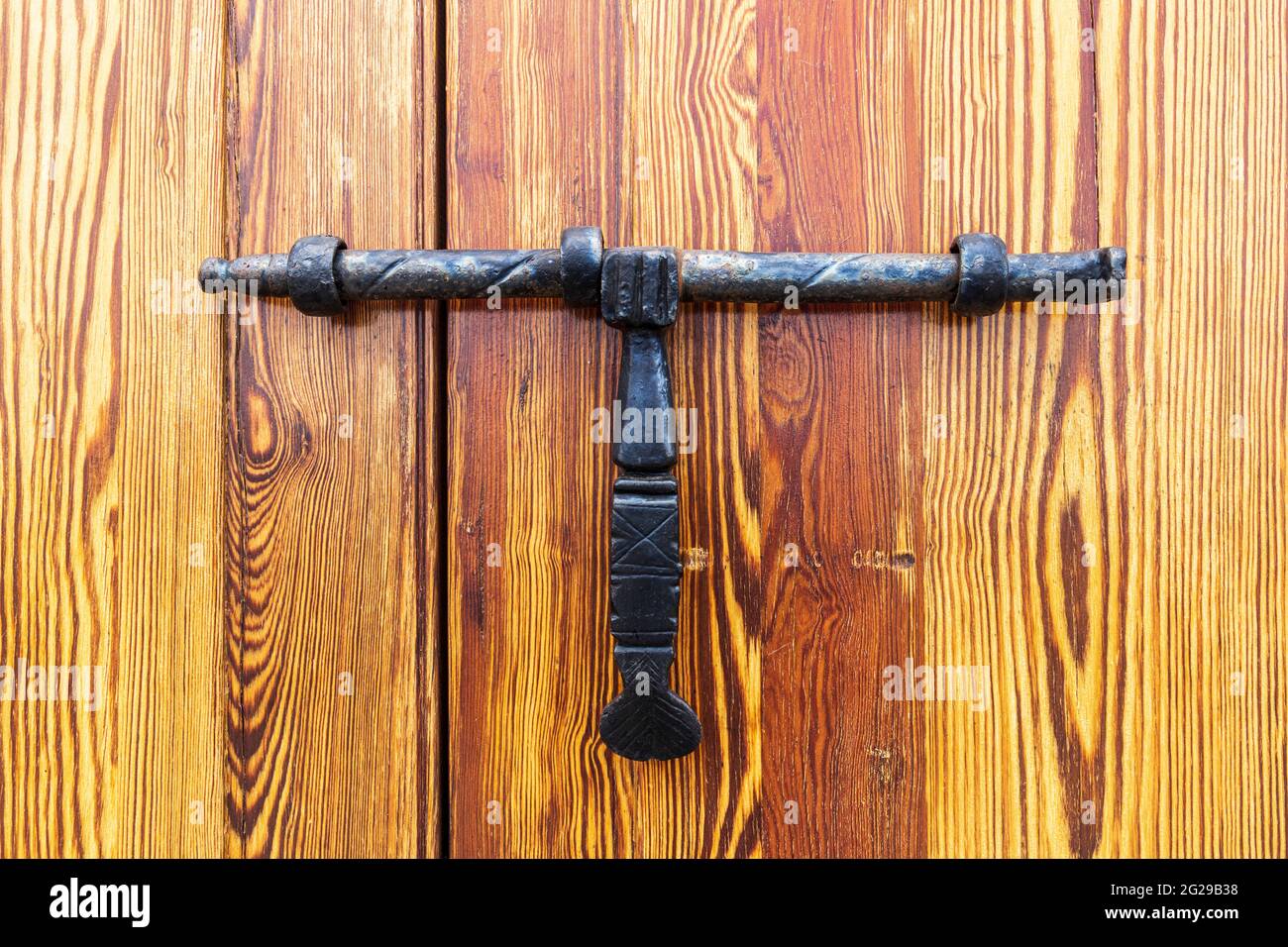 Cast iron bolt on a wooden door with strong woodgrain in Las Vegas ...