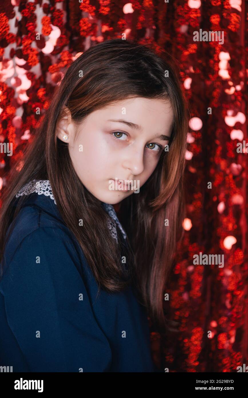 school girl. Schoolgirl on a red background portrait. A series of ...