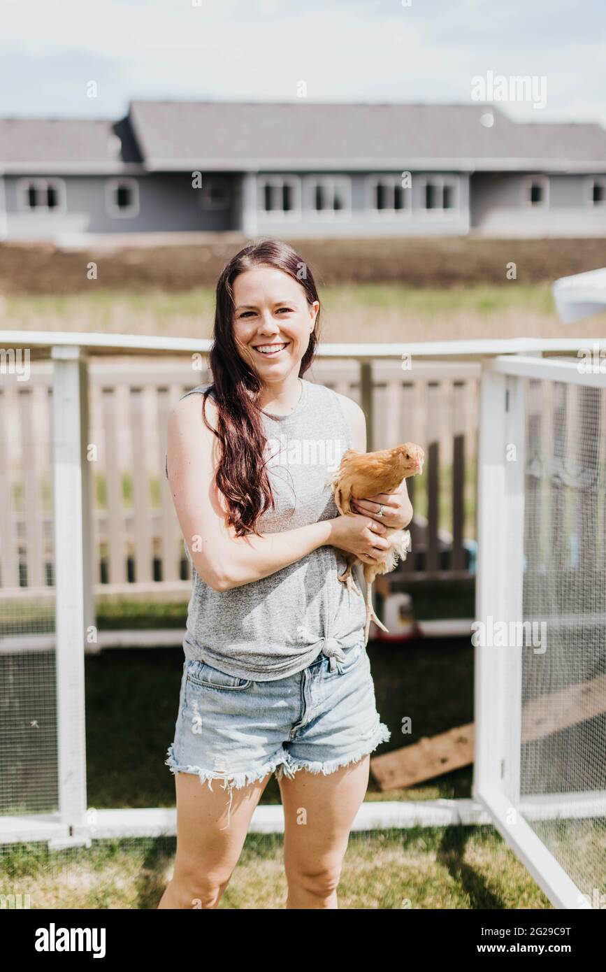 Chicken woman garden hi-res stock photography and images - Alamy