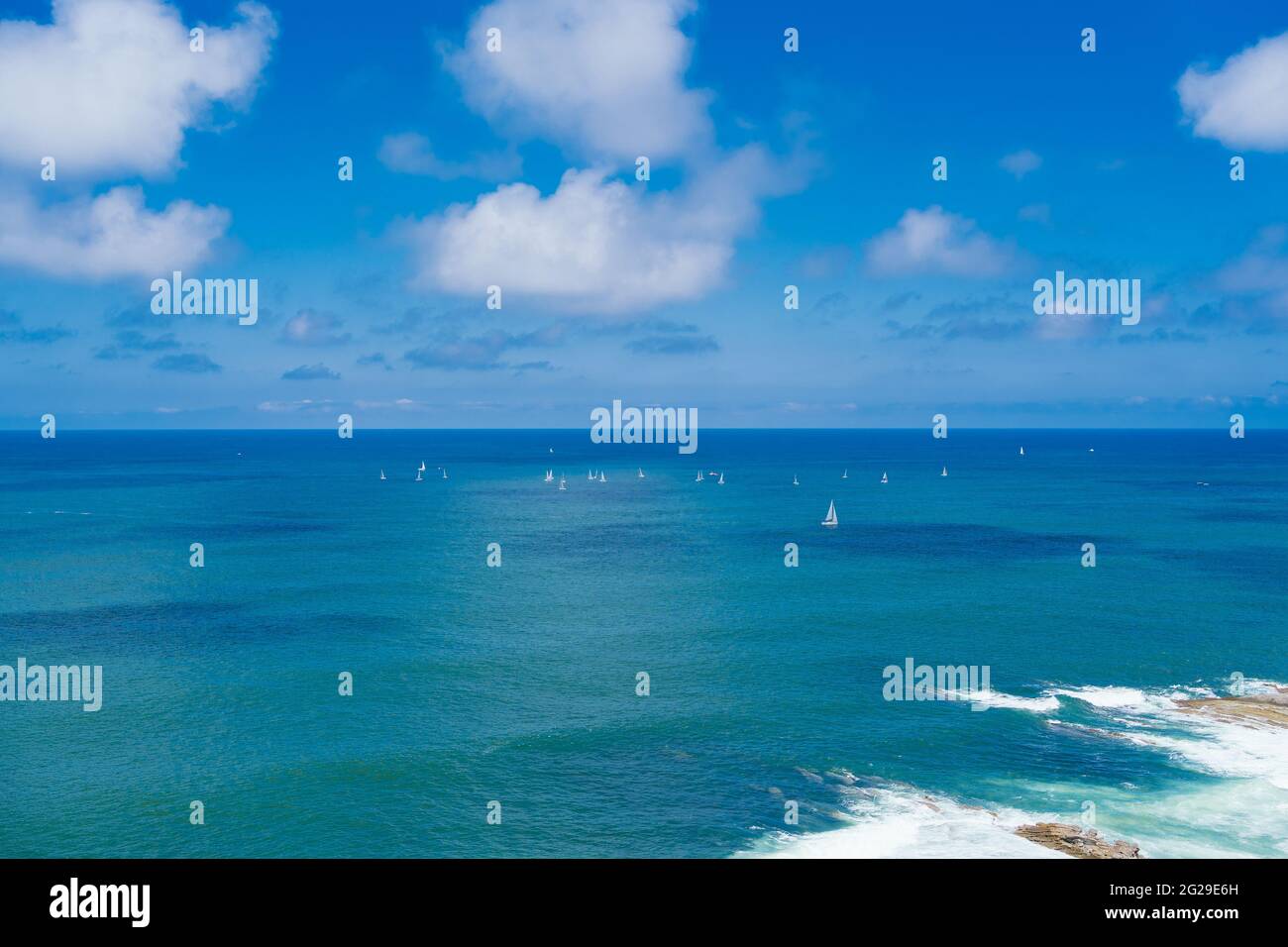 pleasure sailboats sailing the blue sea Stock Photo - Alamy