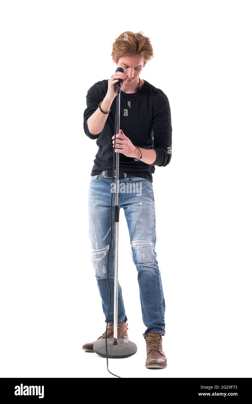 Microphone ready on stage performer Cut Out Stock Images & Pictures - Alamy