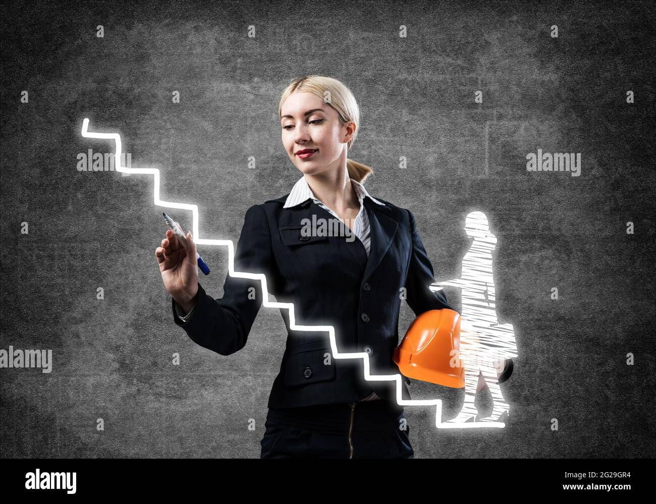 Business lady drawing success graph of career Stock Photo - Alamy