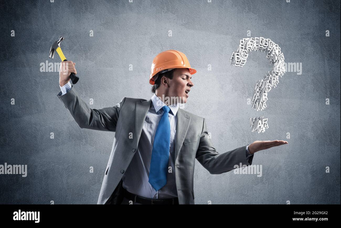 Businessman going to crash question mark Stock Photo - Alamy