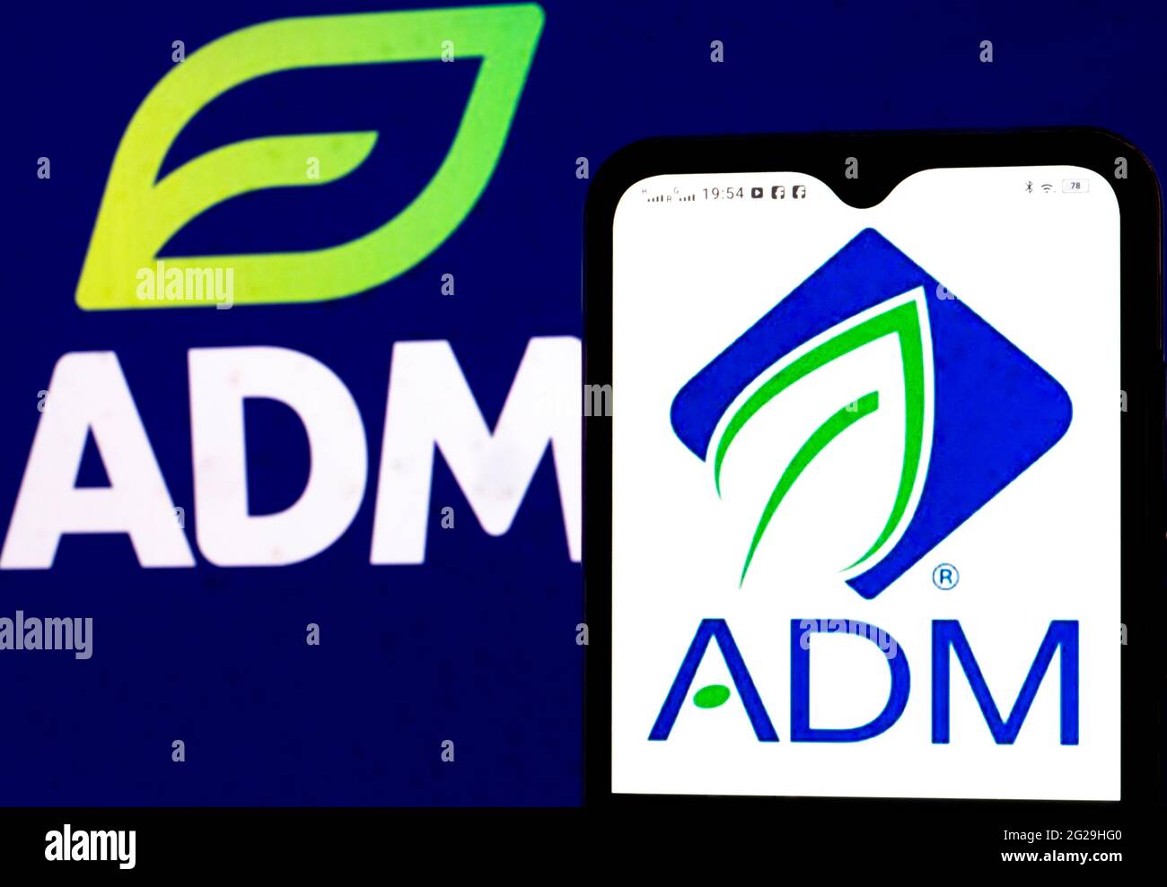 In this photo illustration Archer Daniels Midland Company logo seen ...