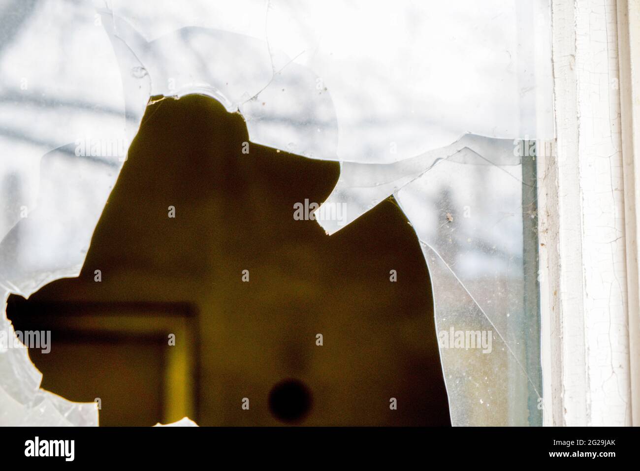 Old wooden frame and broken glass window on an old building for ...
