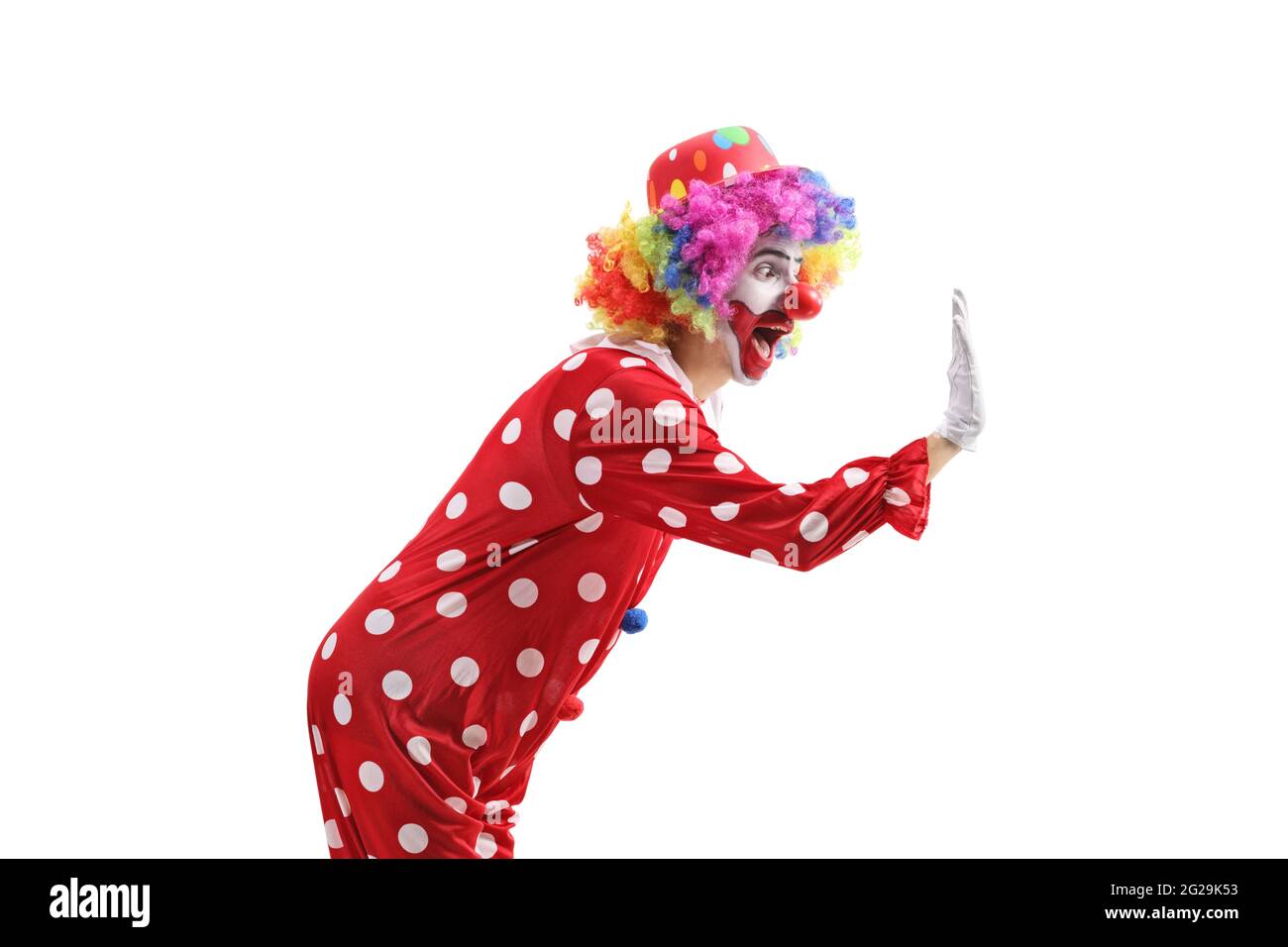 Happy cheerful clown gesturing high-five isolated on white background ...