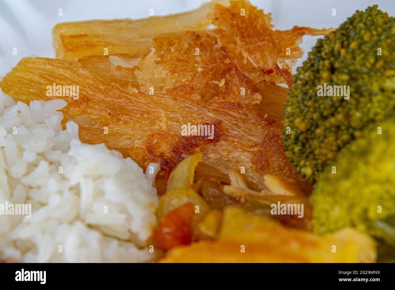Typical Brazilian dish with rice and beans and salad and chicken meat ...