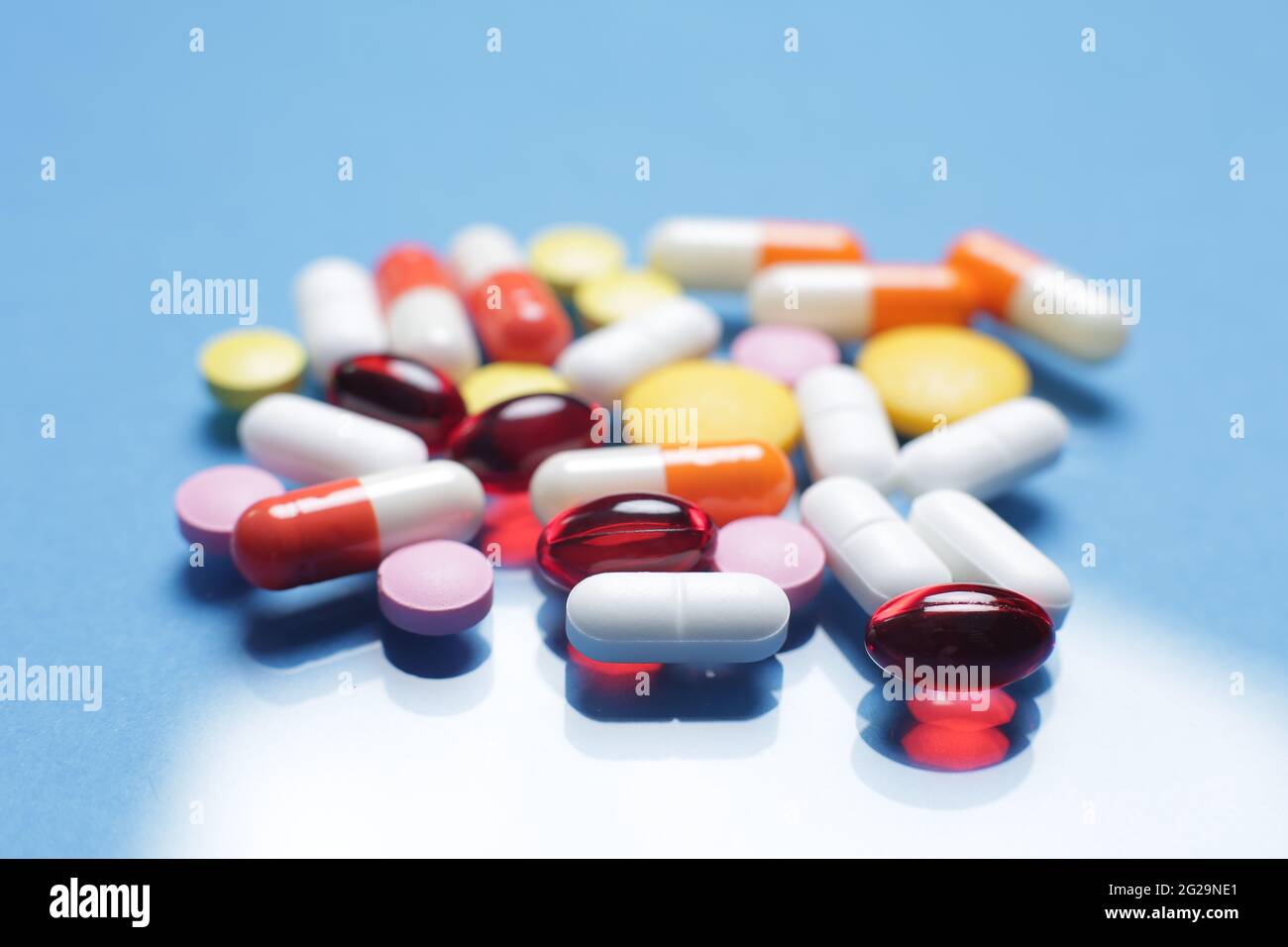 Colorful of tablets and capsules pill in blister packaging arranged ...