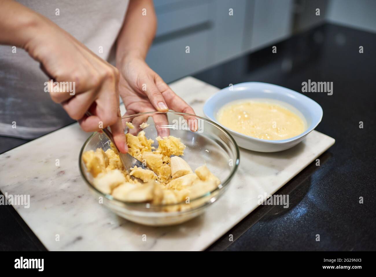 Squashing banana hi-res stock photography and images - Alamy