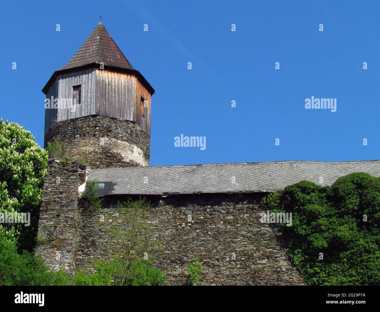 Medieval gothic castle on a rock, tower and main building, Czech ...