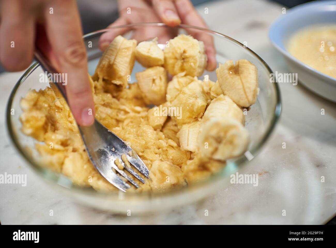 Squashing banana hi-res stock photography and images - Alamy