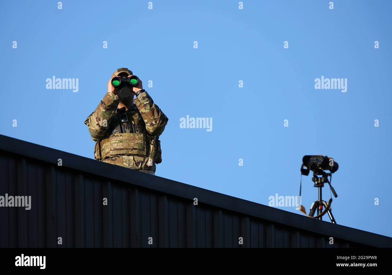 Military personnel on a roof at RAF Mildenhall in Suffolk, before the ...