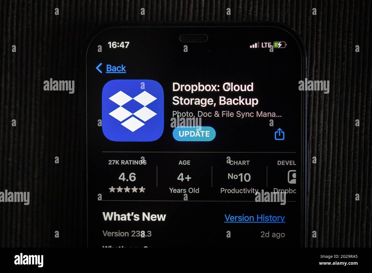 Dropbox app in the apple App Store seen on an iPhone 12 screen Stock ...