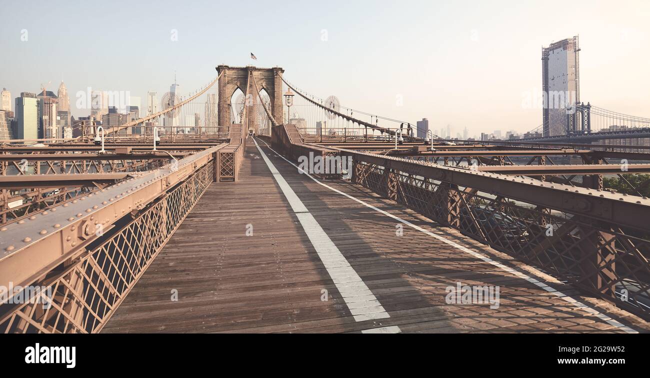 Panoramic view of Brooklyn Bridge, color toned picture, New York City ...