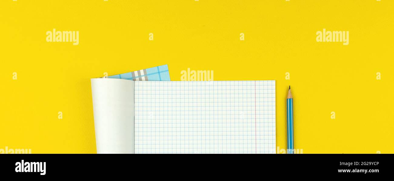 Education banner with opened school notebook with checkered math paper ...