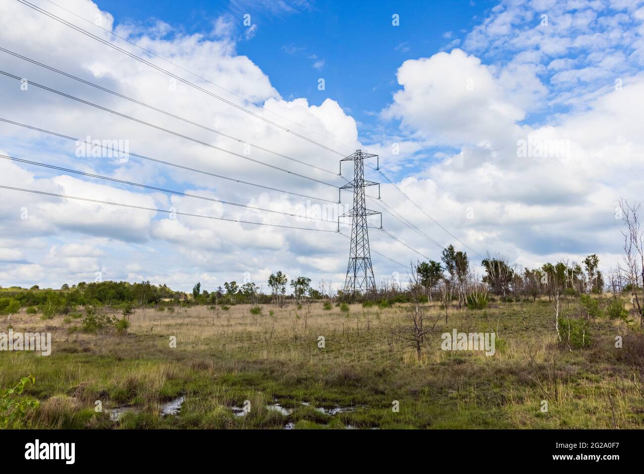 Electricity pylon and overhead transmission cables running through ...