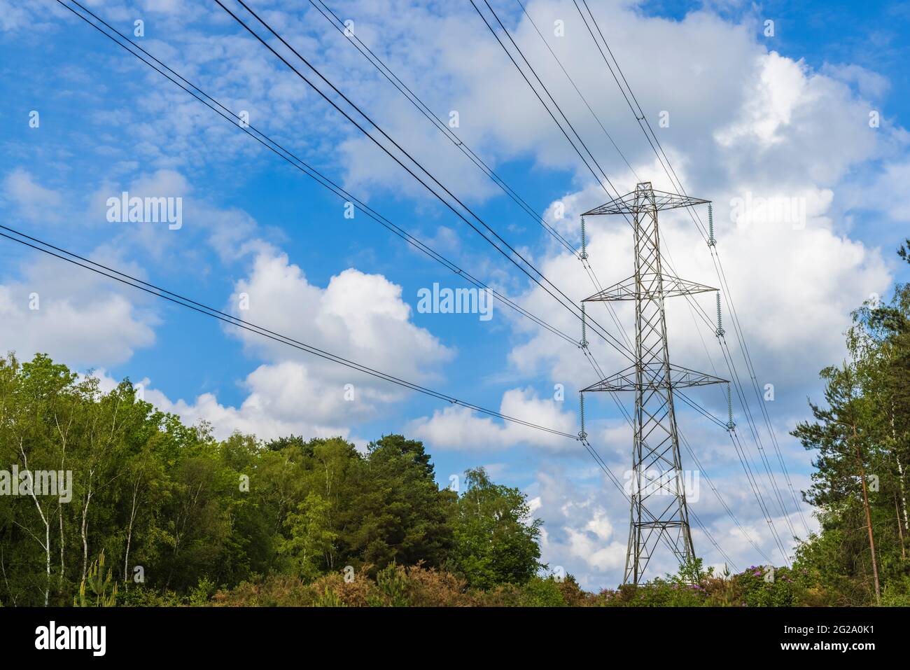 Electricity pylon and overhead transmission cables running through ...