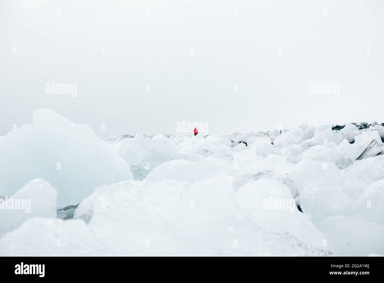 Back view of unrecognizable person traveler in warm clothing and with ...