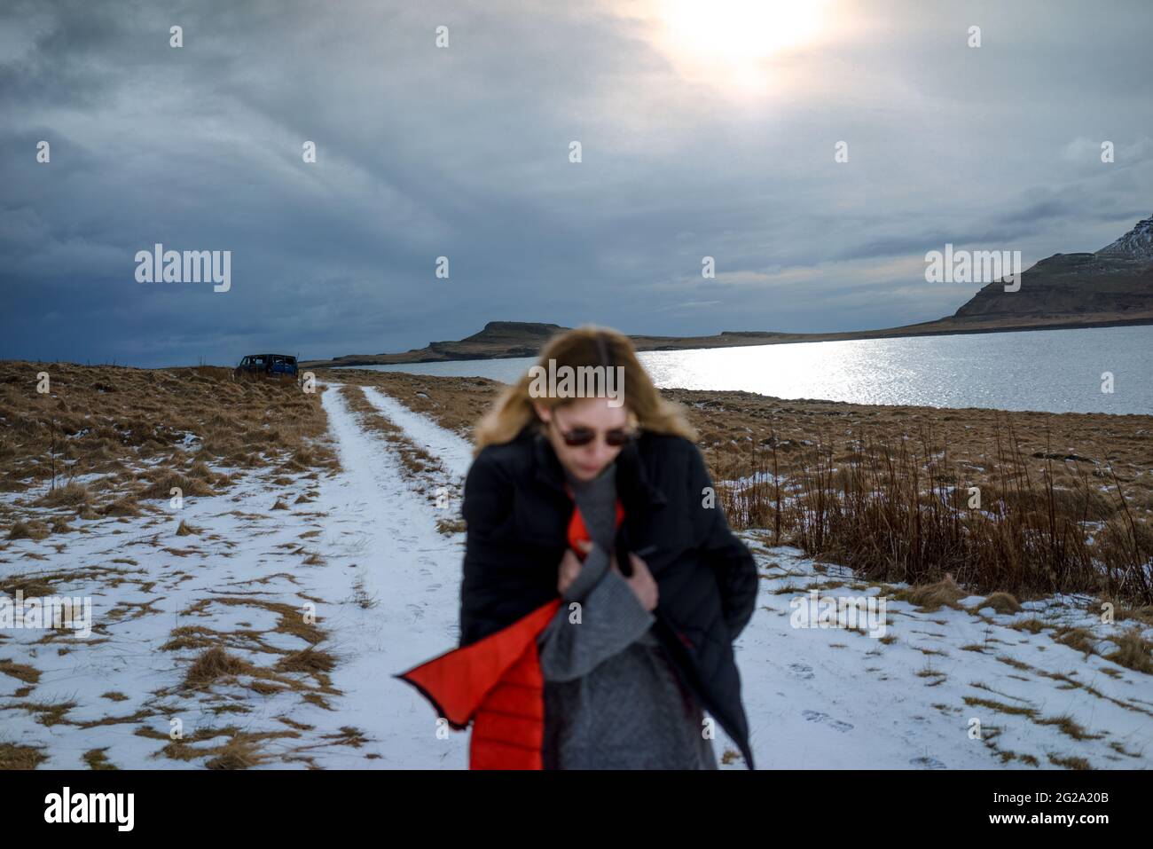 Shivering woman and snow lake hi-res stock photography and images - Alamy