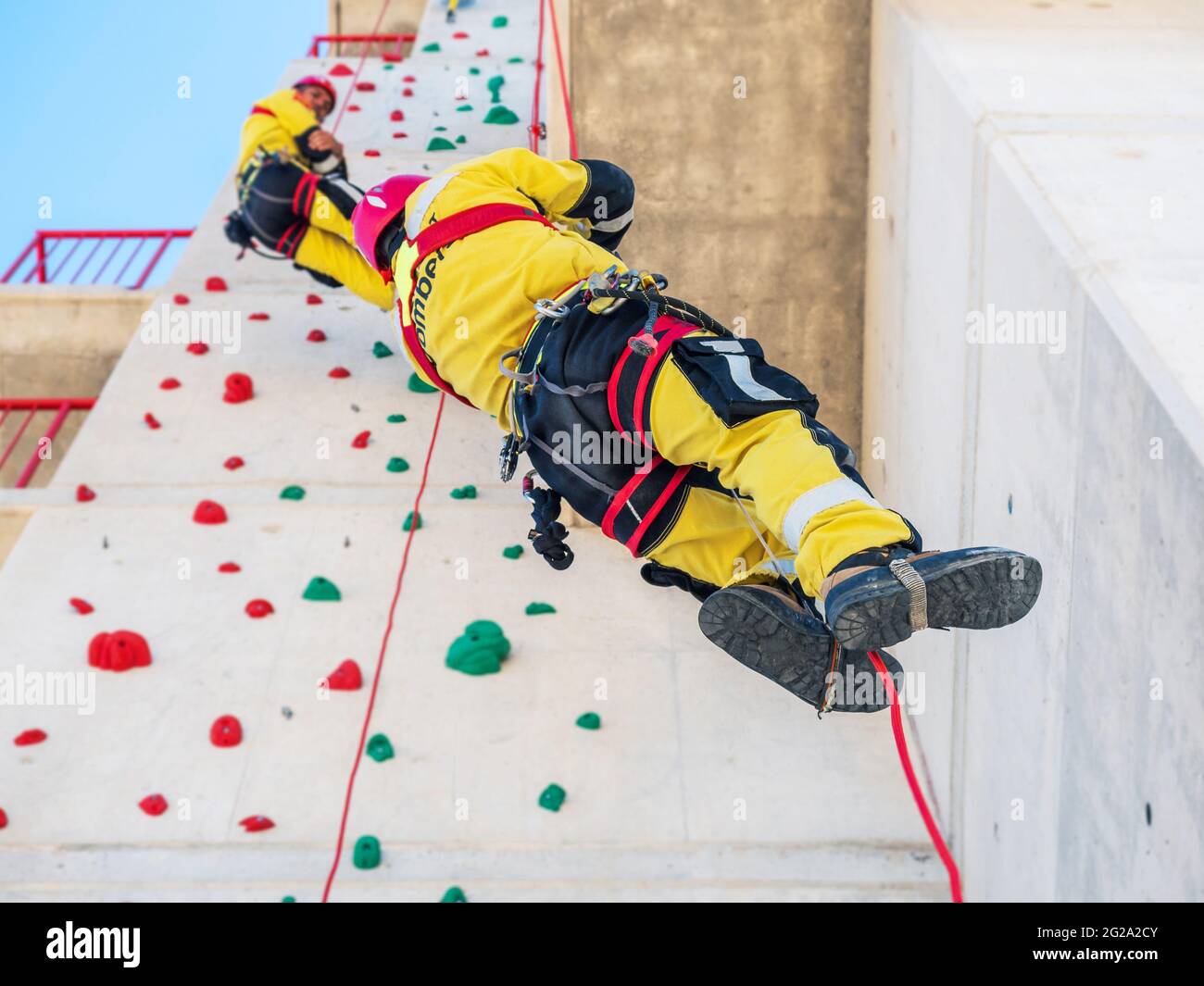 Climber hanging from ropes hi-res stock photography and images - Alamy