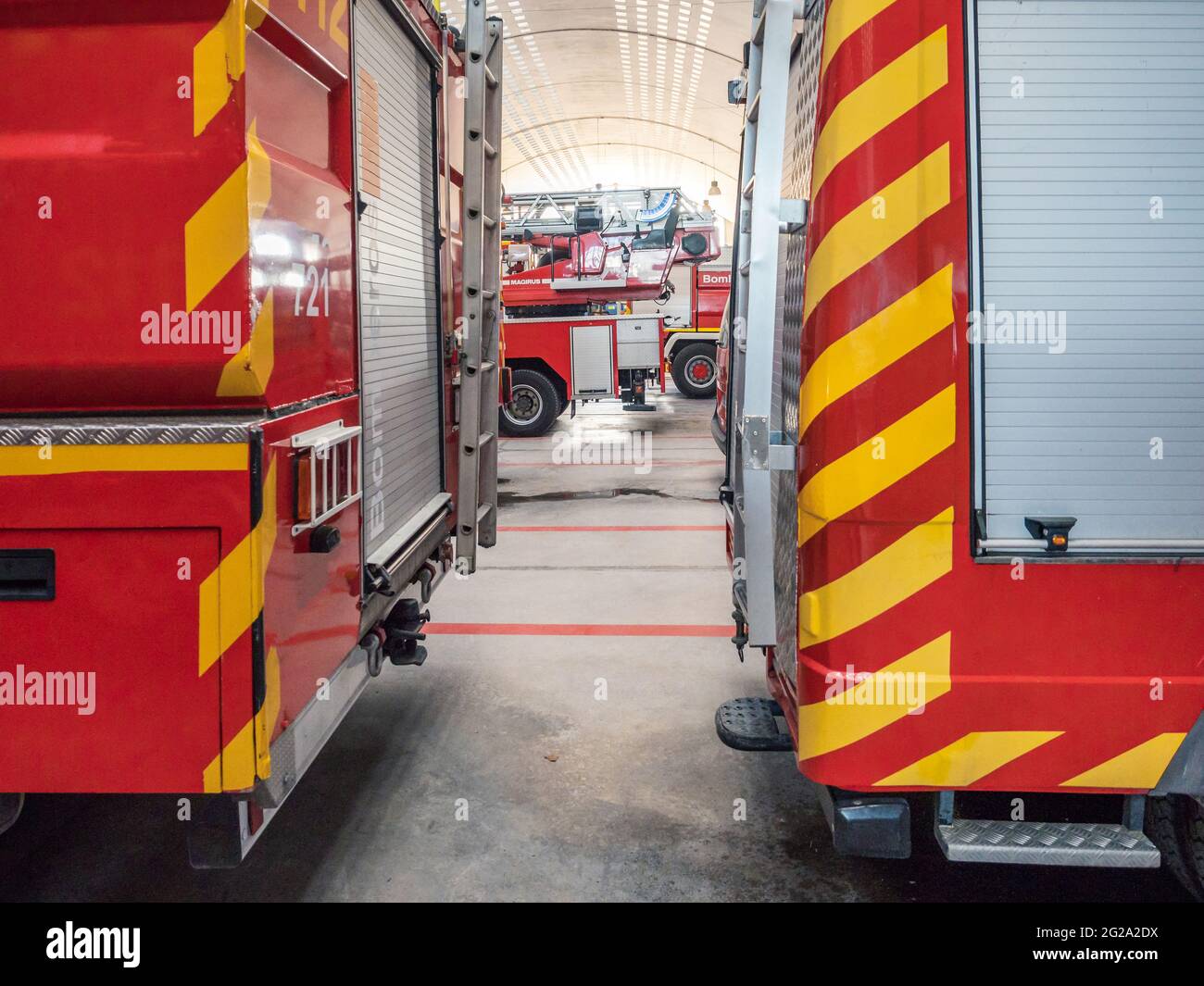 Fleet of Parked emergency vehicles in fire department Stock Photo - Alamy