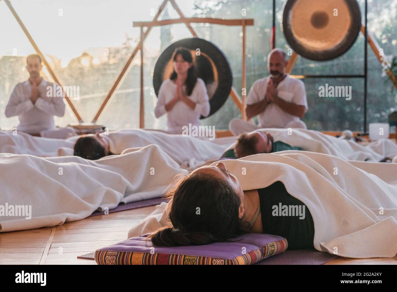 Gong meditation lying hi-res stock photography and images - Alamy