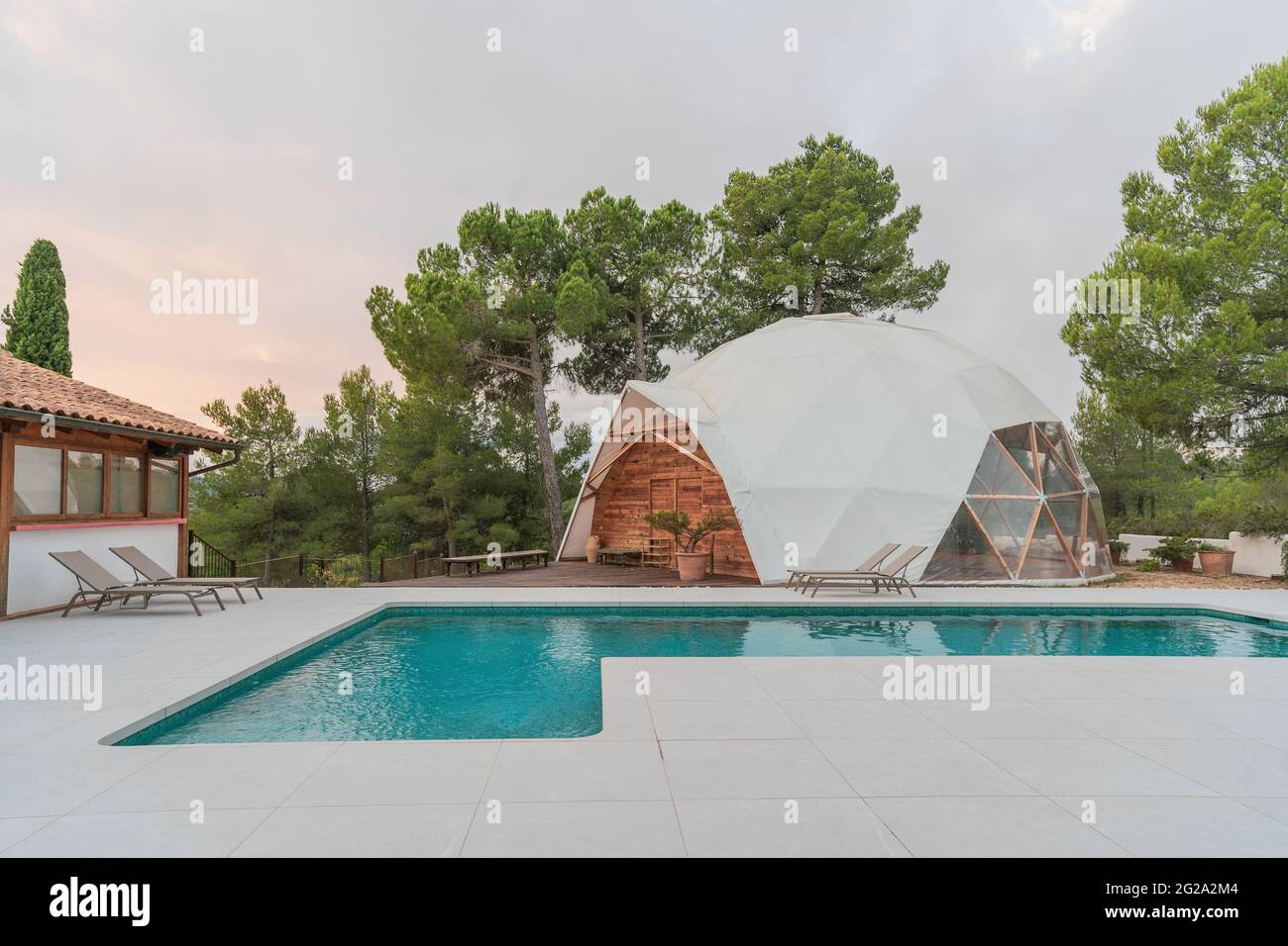 Geometric domed structure for yoga placed in comfortable territory with ...