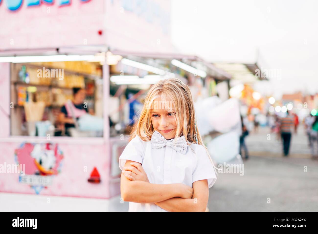 Little girl has fun at the fair with lights Stock Photo - Alamy