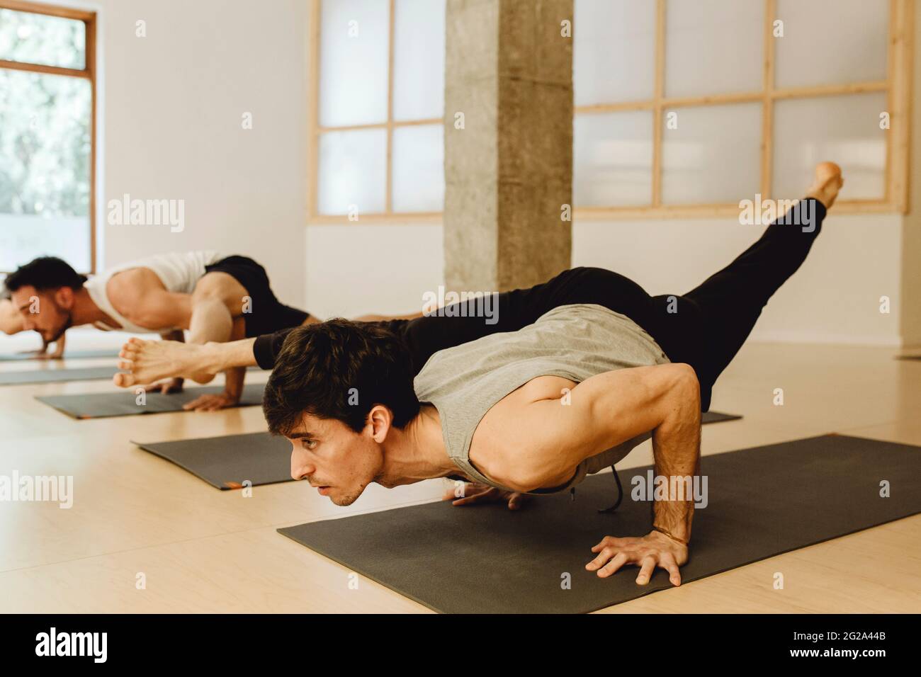 Group practicing yoga hi-res stock photography and images - Alamy