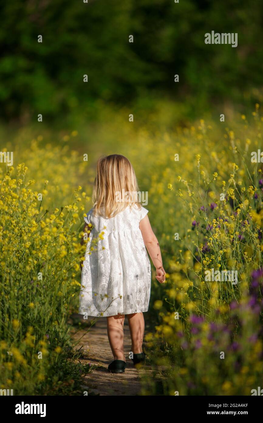 Little Girl Standing Back