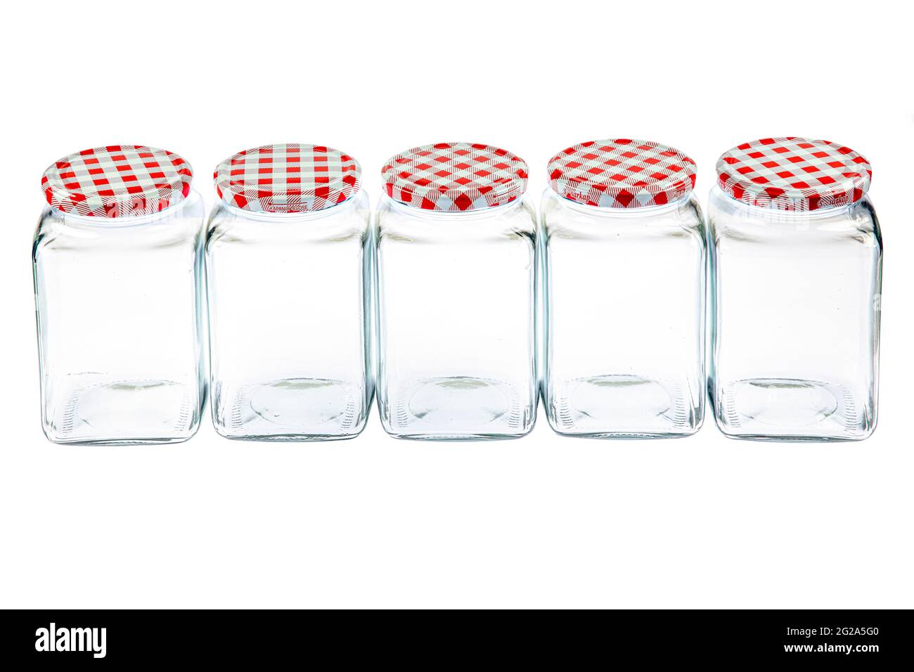 Glass storage jar on a white background. Set of empty jars isolated on ...