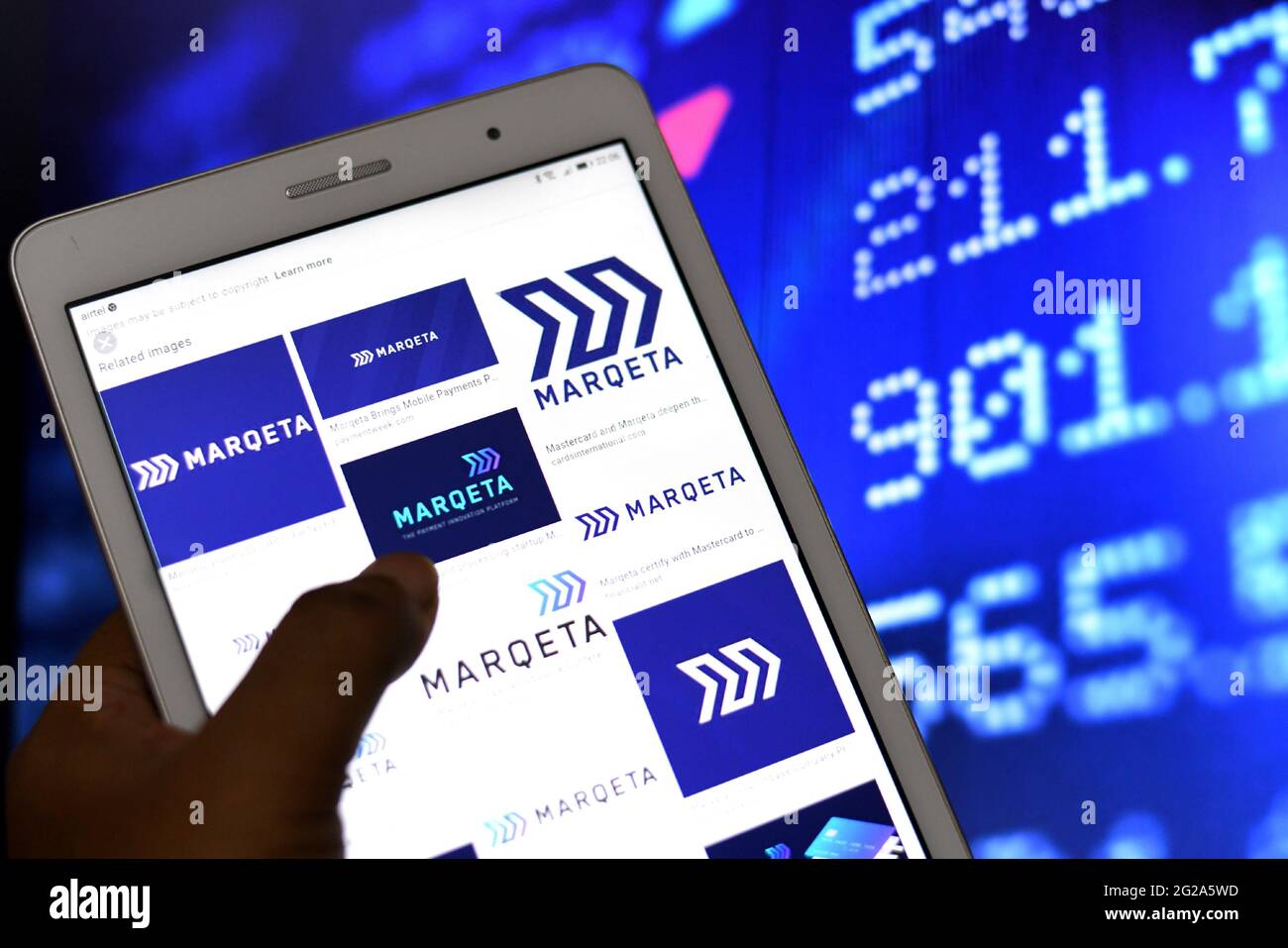 In this photo illustration, Marqeta logos seen displayed on an Android ...